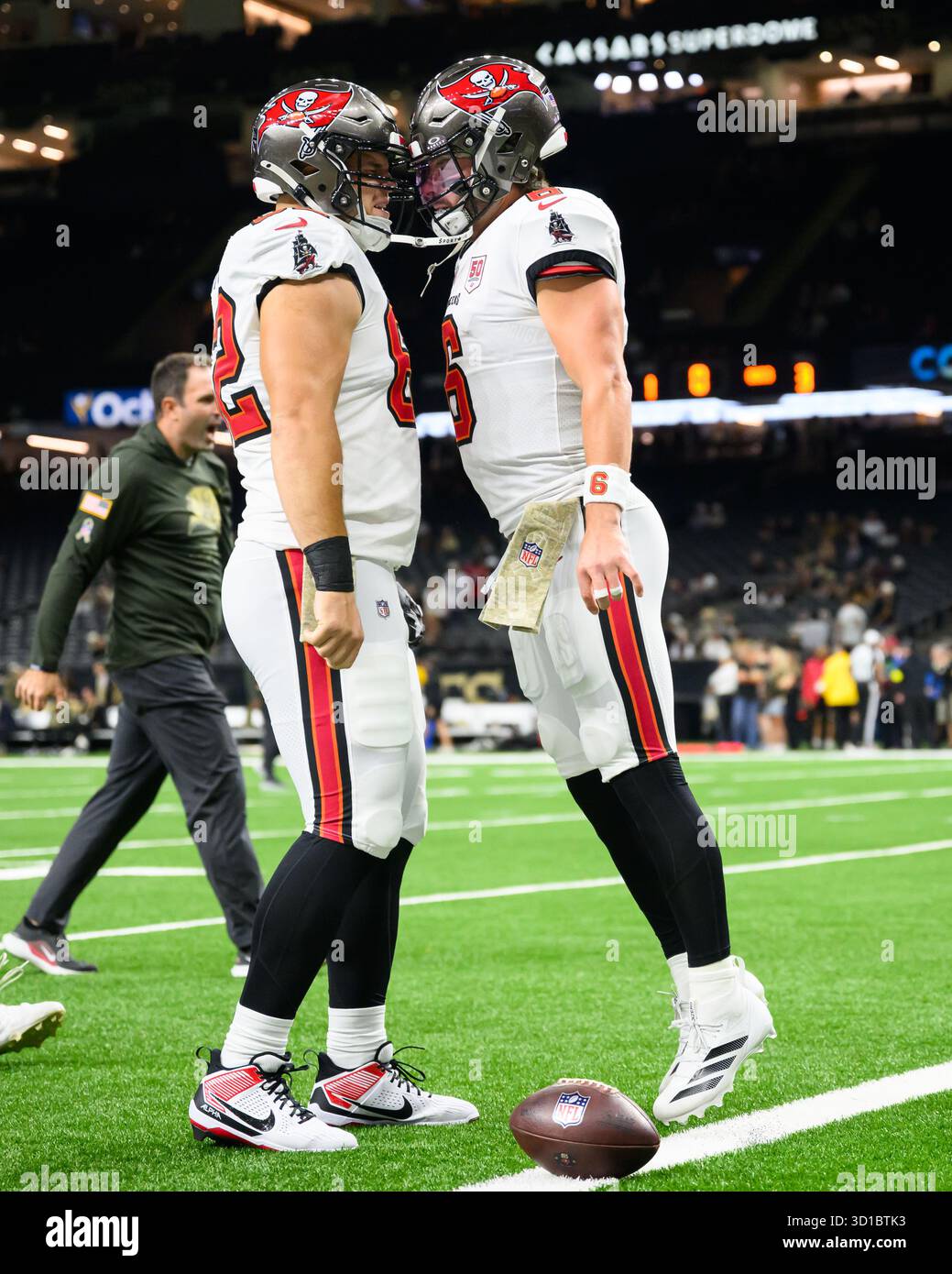Tampa Bay Buccaneers quarterback Baker Mayfield (6), right, and center ...