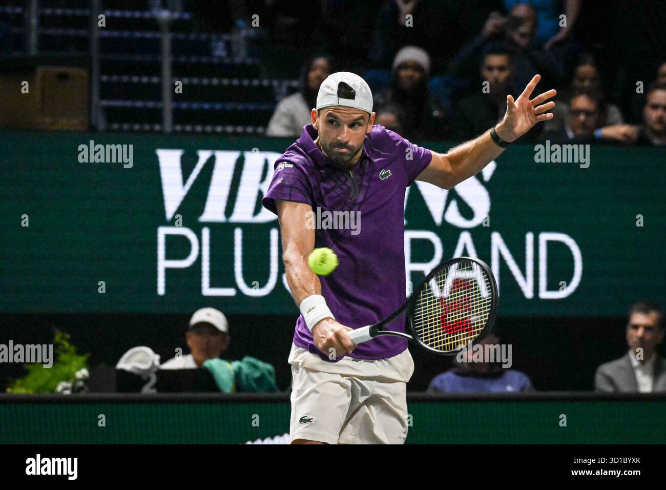 Giovanni Mpetshi Perricard and Grigor Dimitrov compete during the Rolex ...
