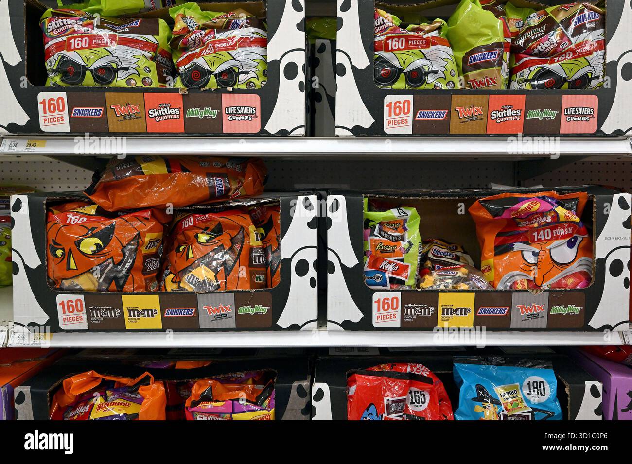 Large packs of candy stacked on supermarket shelves days before ...