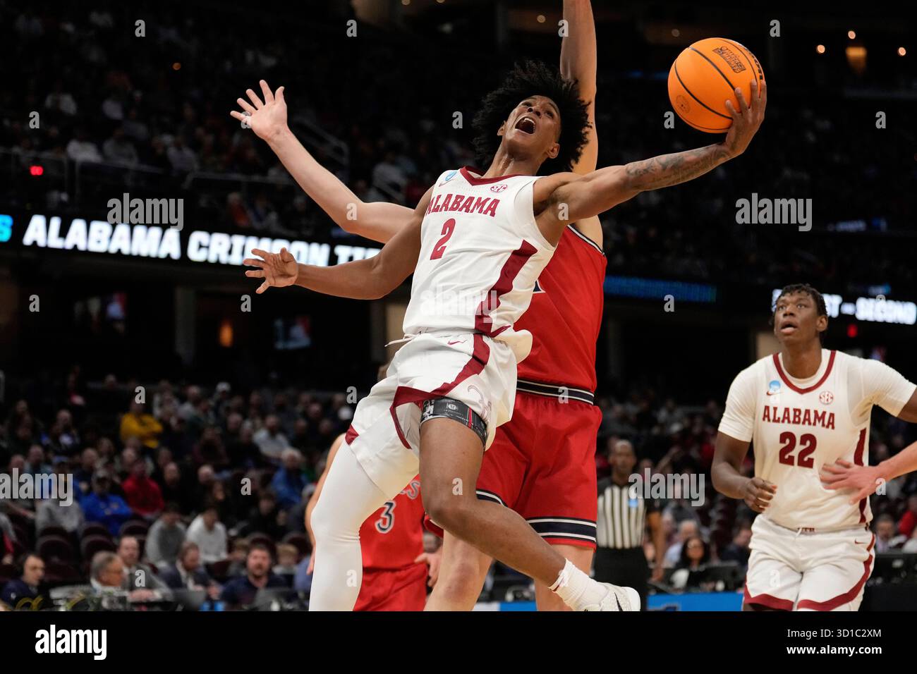 FILE - Alabama guard Aden Holloway (2) shoots in front of Saint Mary's ...