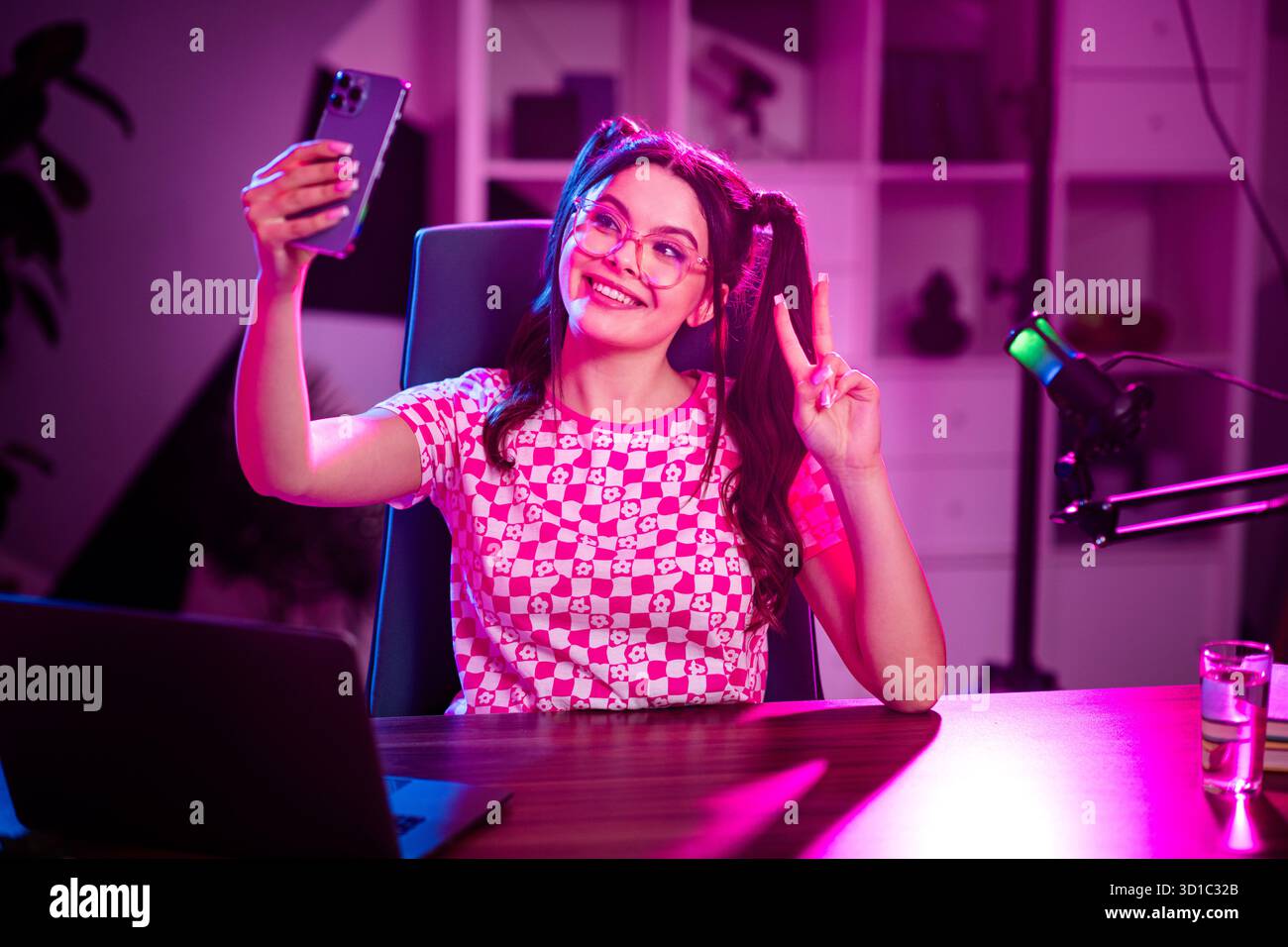 Popular female streamer recording hi-res stock photography and images ...