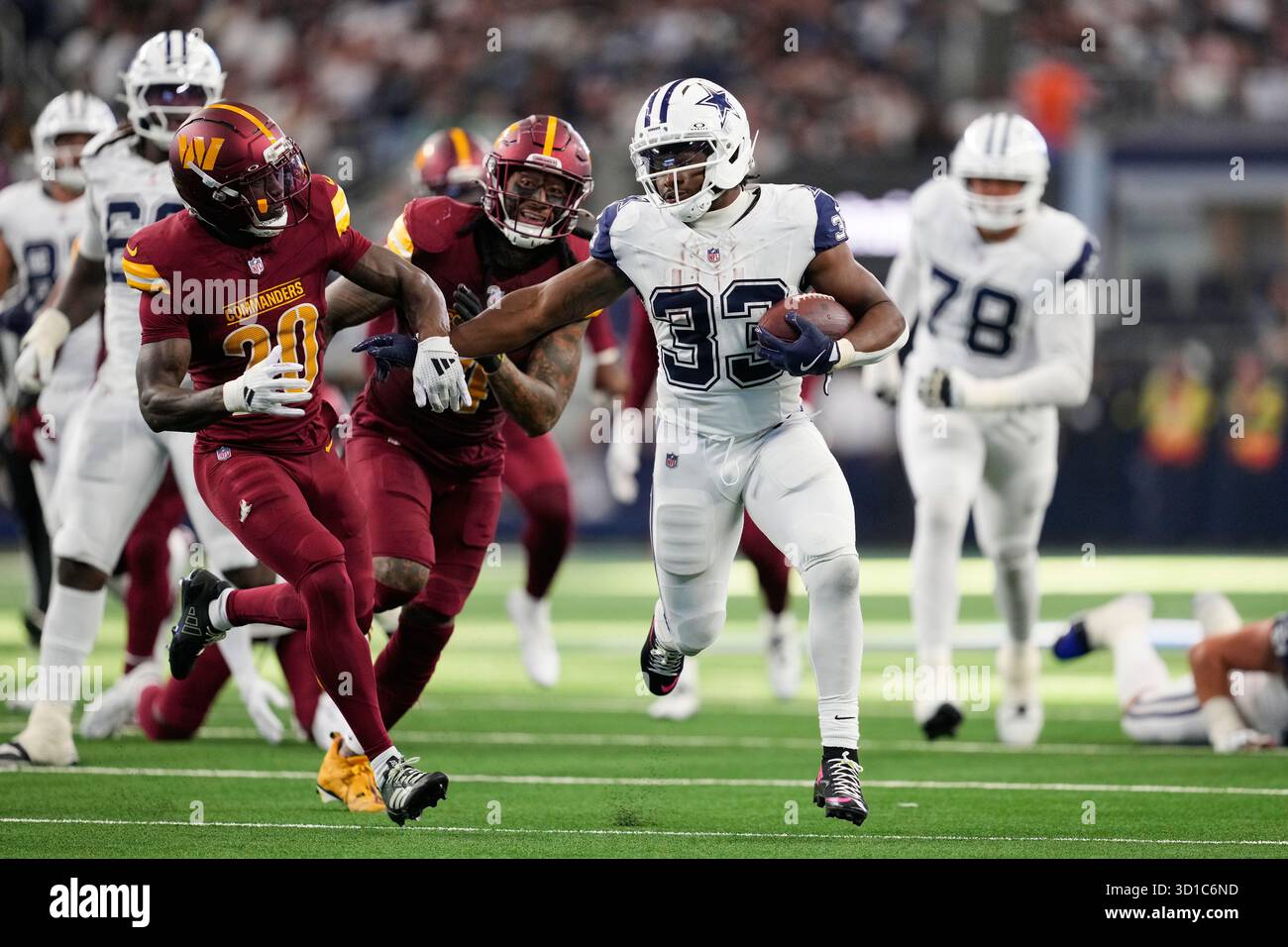 Dallas Cowboys running back Javonte Williams (33) runs the ball as ...