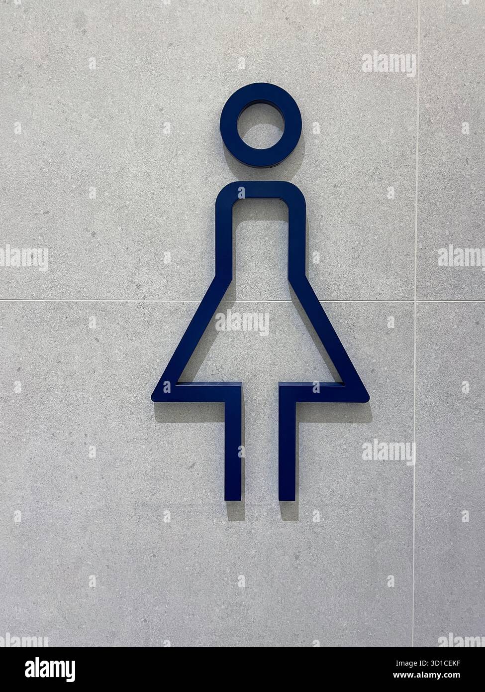 Minimalist blue female restroom sign with abstract geometric design ...
