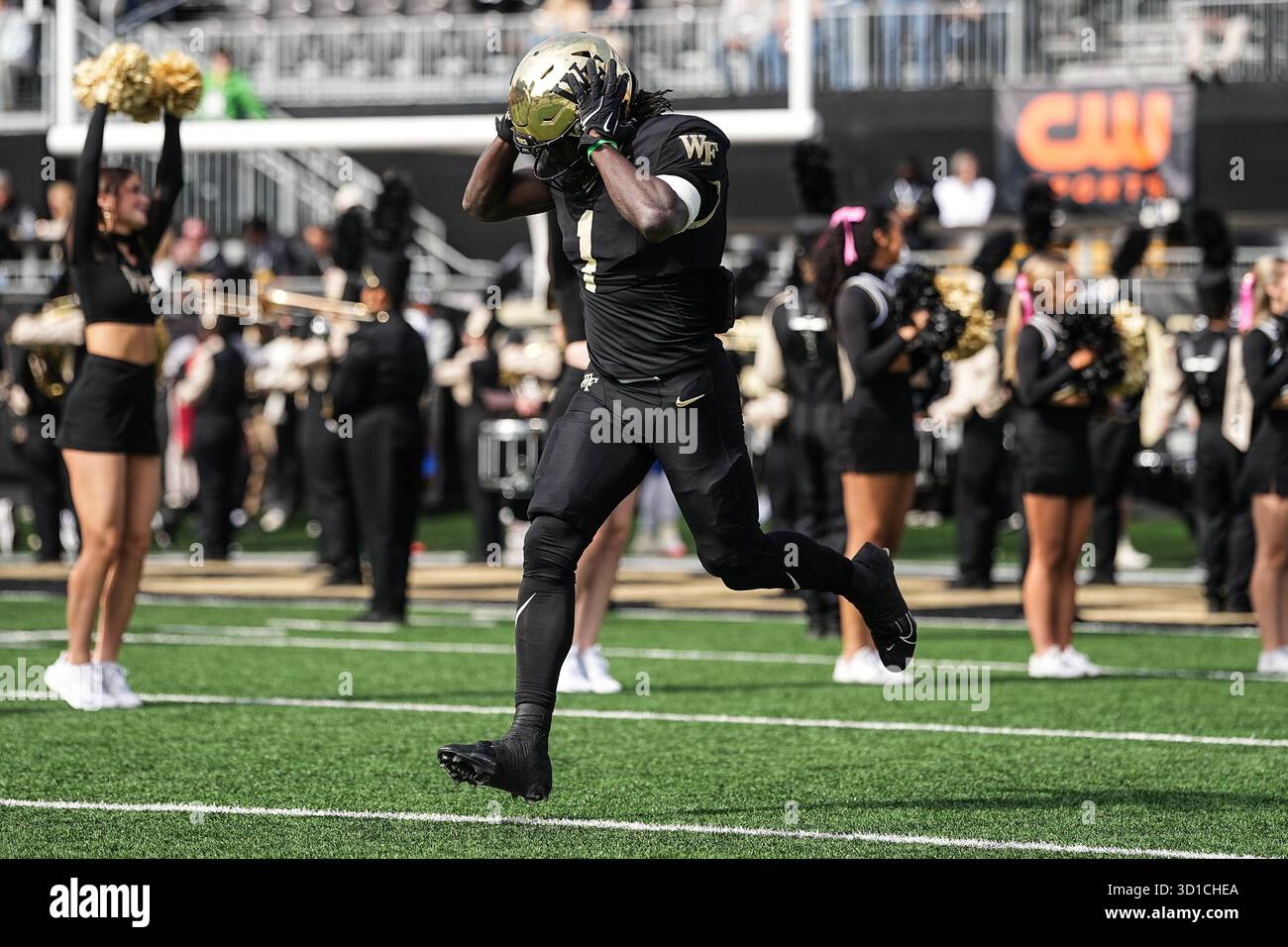 Wake Forest running back Demond Claiborne (1) runs onto the field prior ...