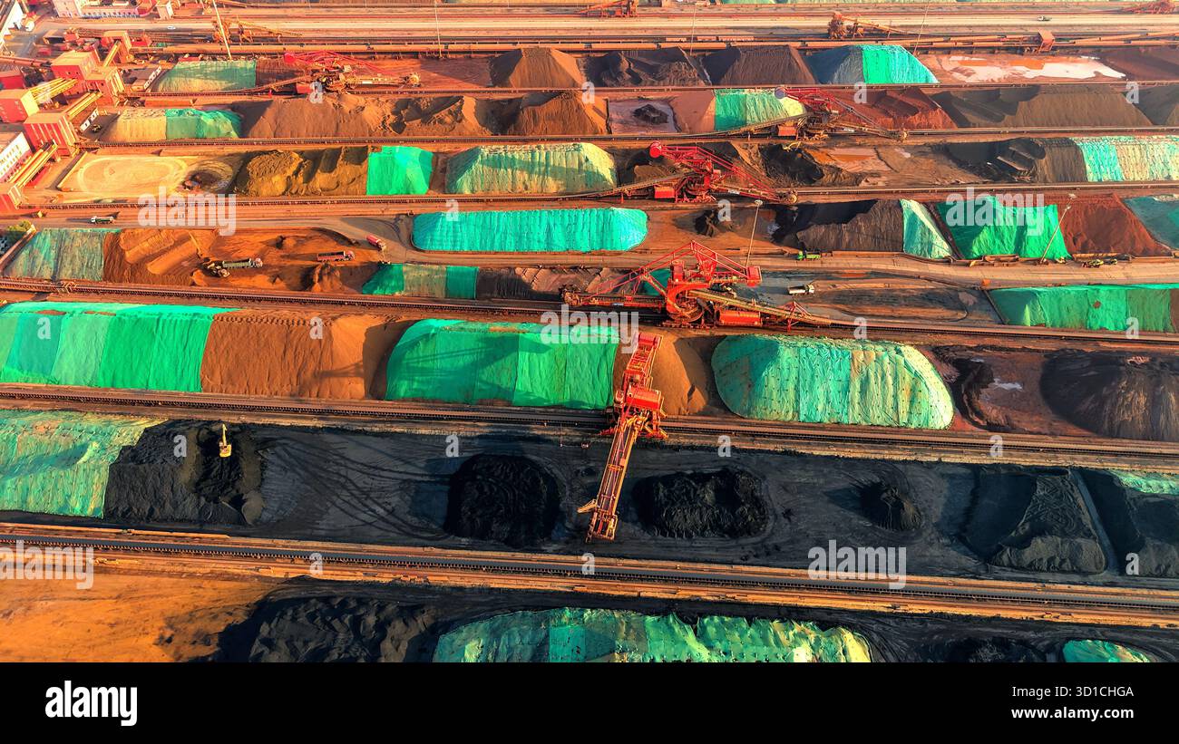 Imported iron ore piled up at the Qingdao Port ore terminal in Qingdao ...