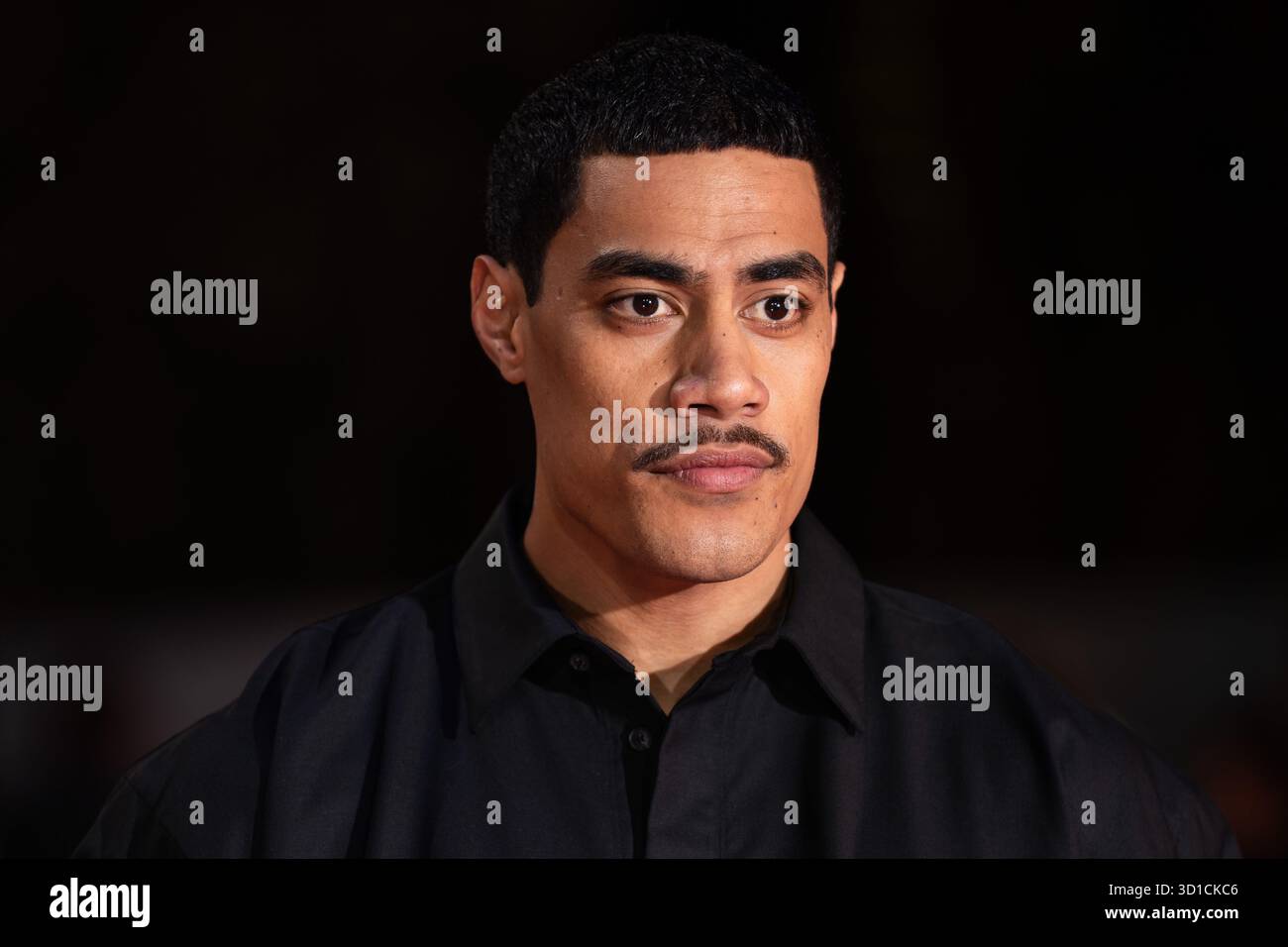Dimitrius Koloamatangi poses for photographers upon arrival at the ...