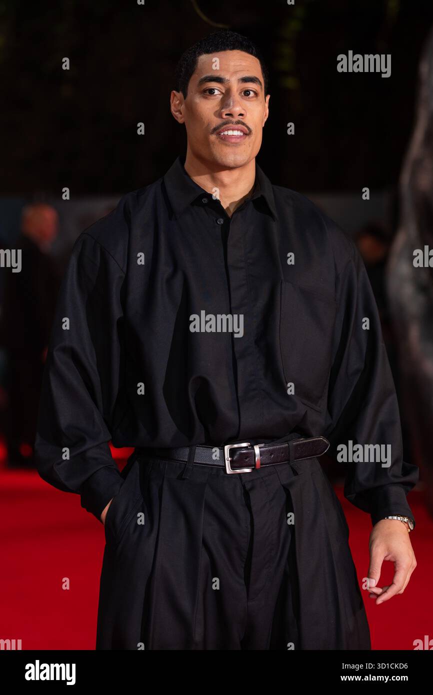 Dimitrius Koloamatangi poses for photographers upon arrival at the ...