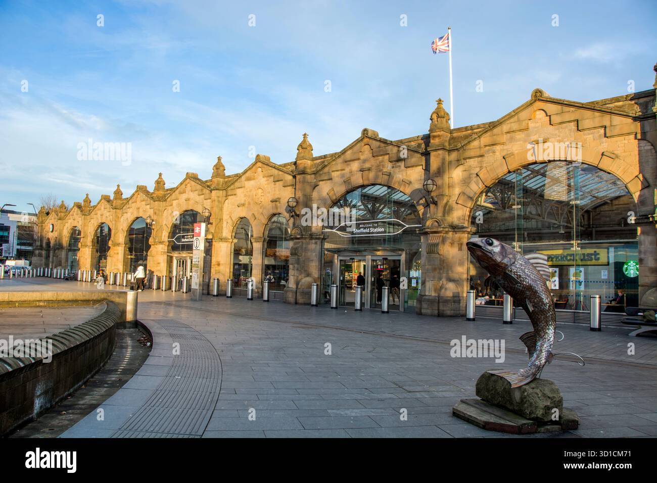 Entrance of EMR Sheffield Station with public artwork salmon of steel ...