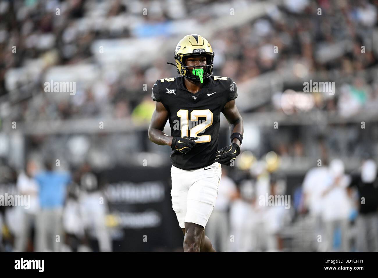Central Florida wide receiver Carl Jenkins Jr. (12) sets up for a play ...