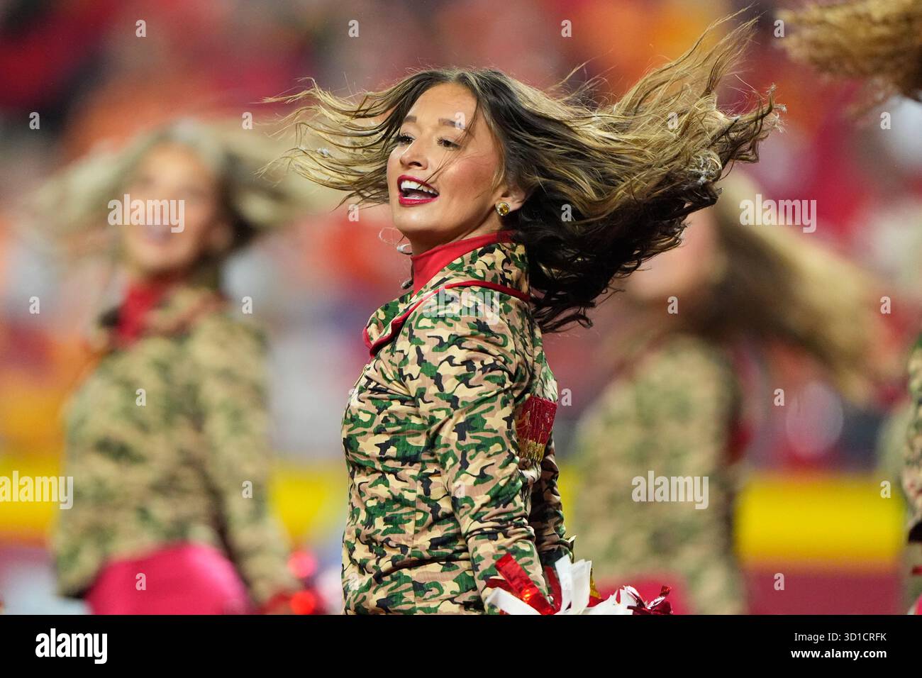 Cheerleaders perform during the first half of an NFL football game ...