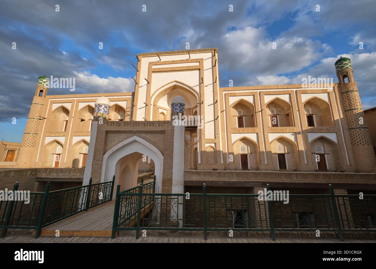 The front facade, entrance of the white Amir tura Madrasah muslim ...