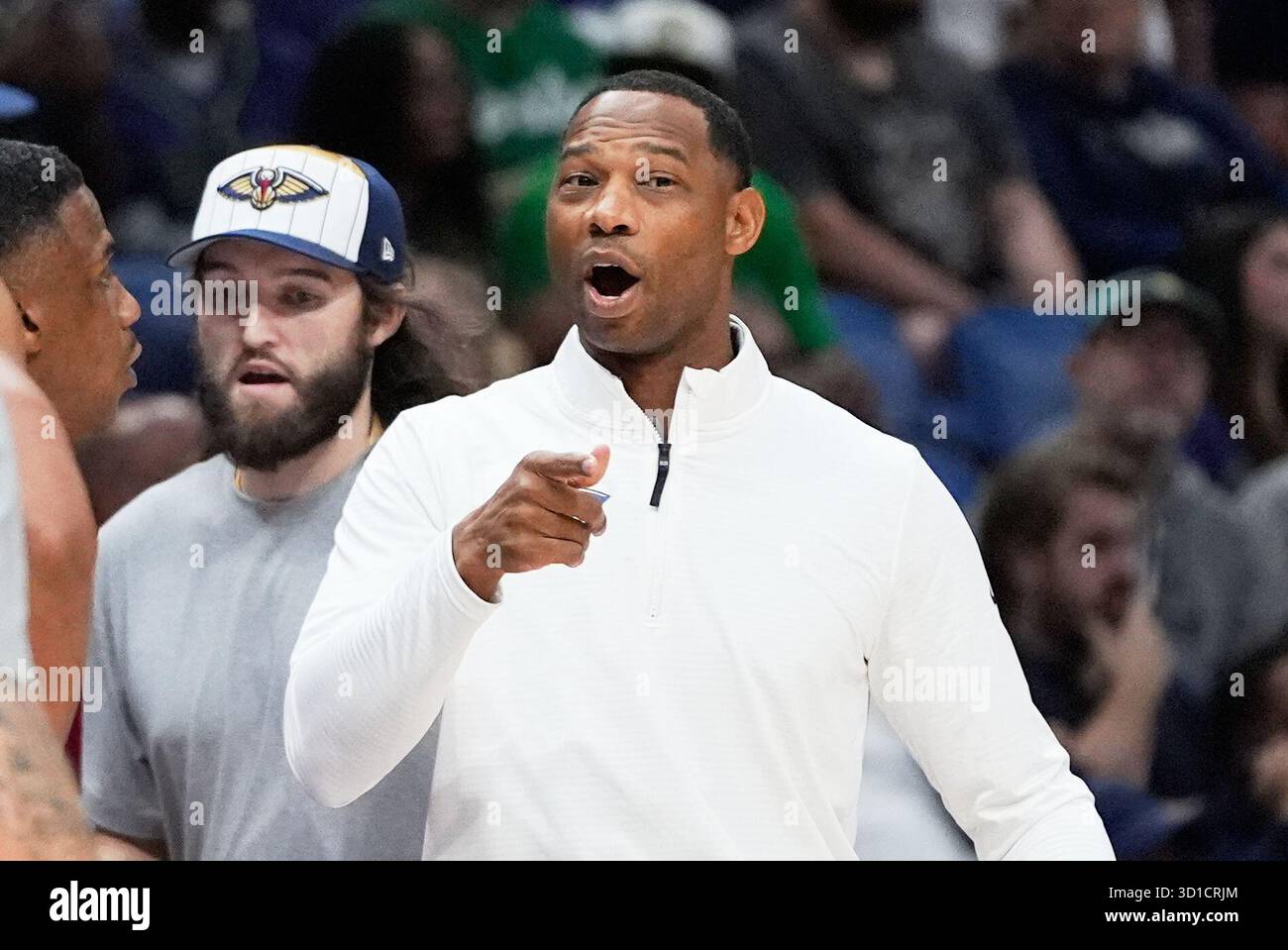 New Orleans Pelicans head coach Willie Green calls out from the bench ...