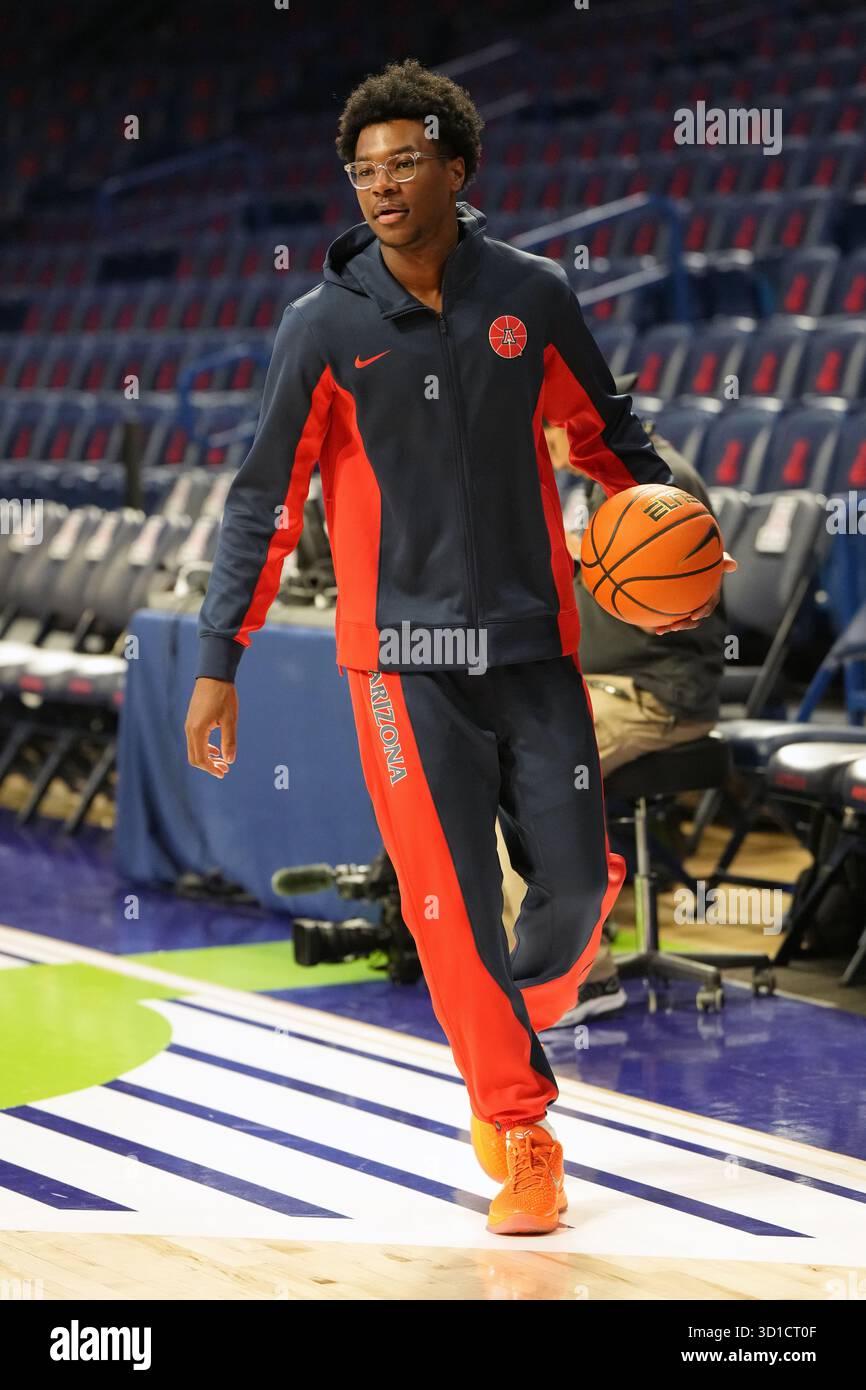 Arizona guard Bryce James (6) warms up before an NCAA college ...