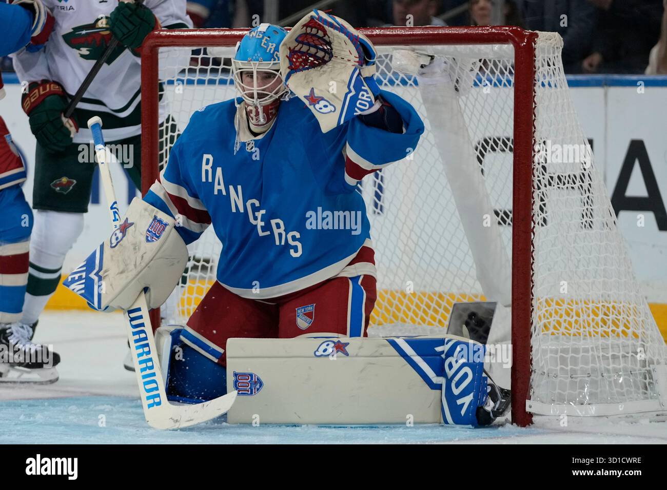 New York Rangers goaltender Igor Shesterkin (31) protects the net ...