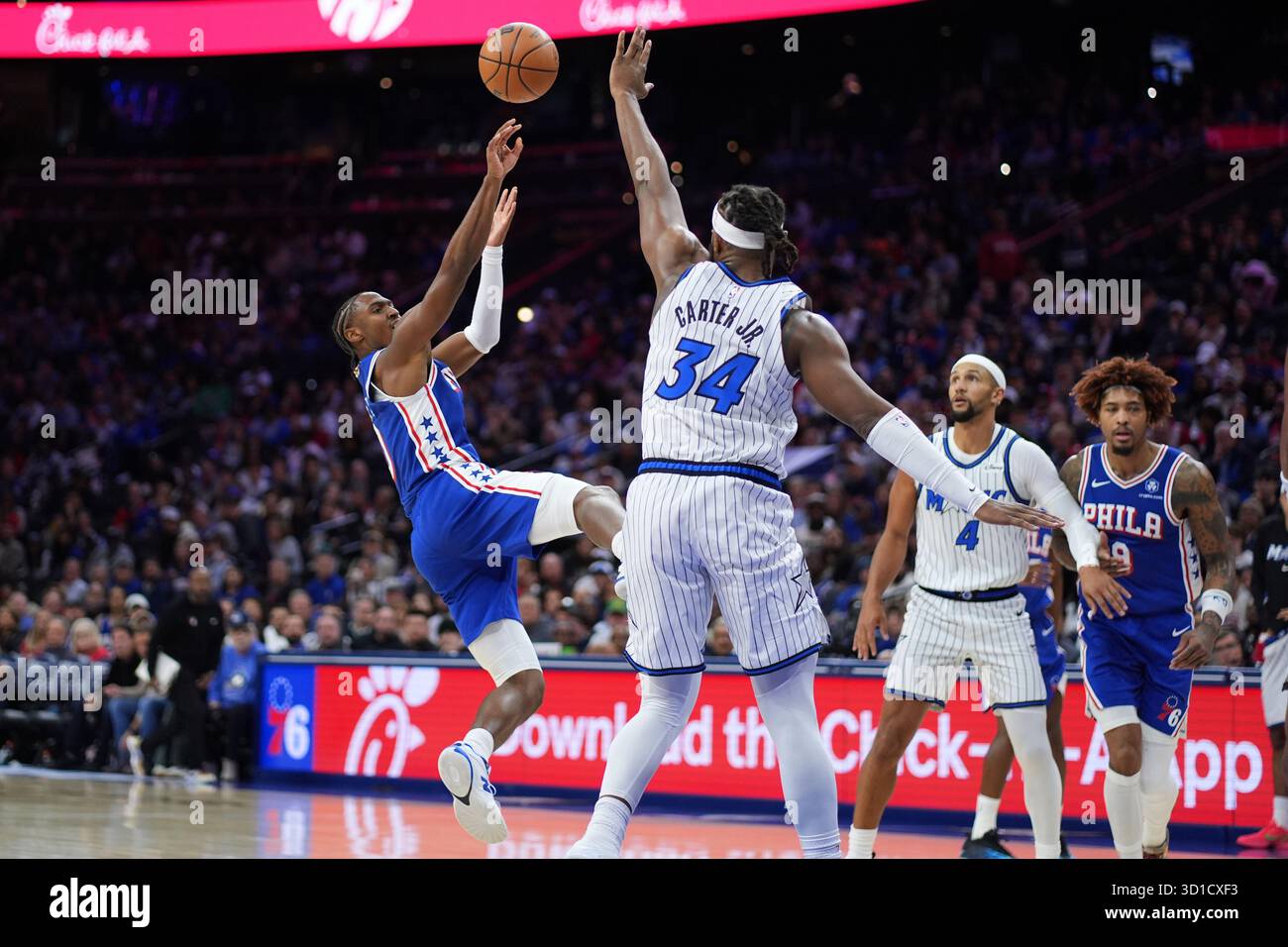 Philadelphia 76ers' Tyrese Maxey, left, goes up for a shot against ...
