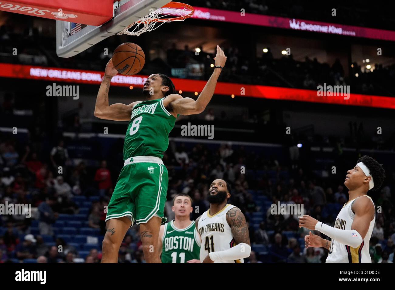 Boston Celtics forward Josh Minott (8) slam dunks against the New ...