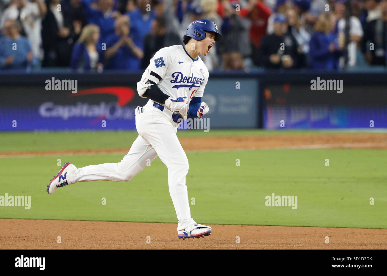 Los Angeles Dodgers designated hitter Shohei Ohtani (17) runs the bases ...