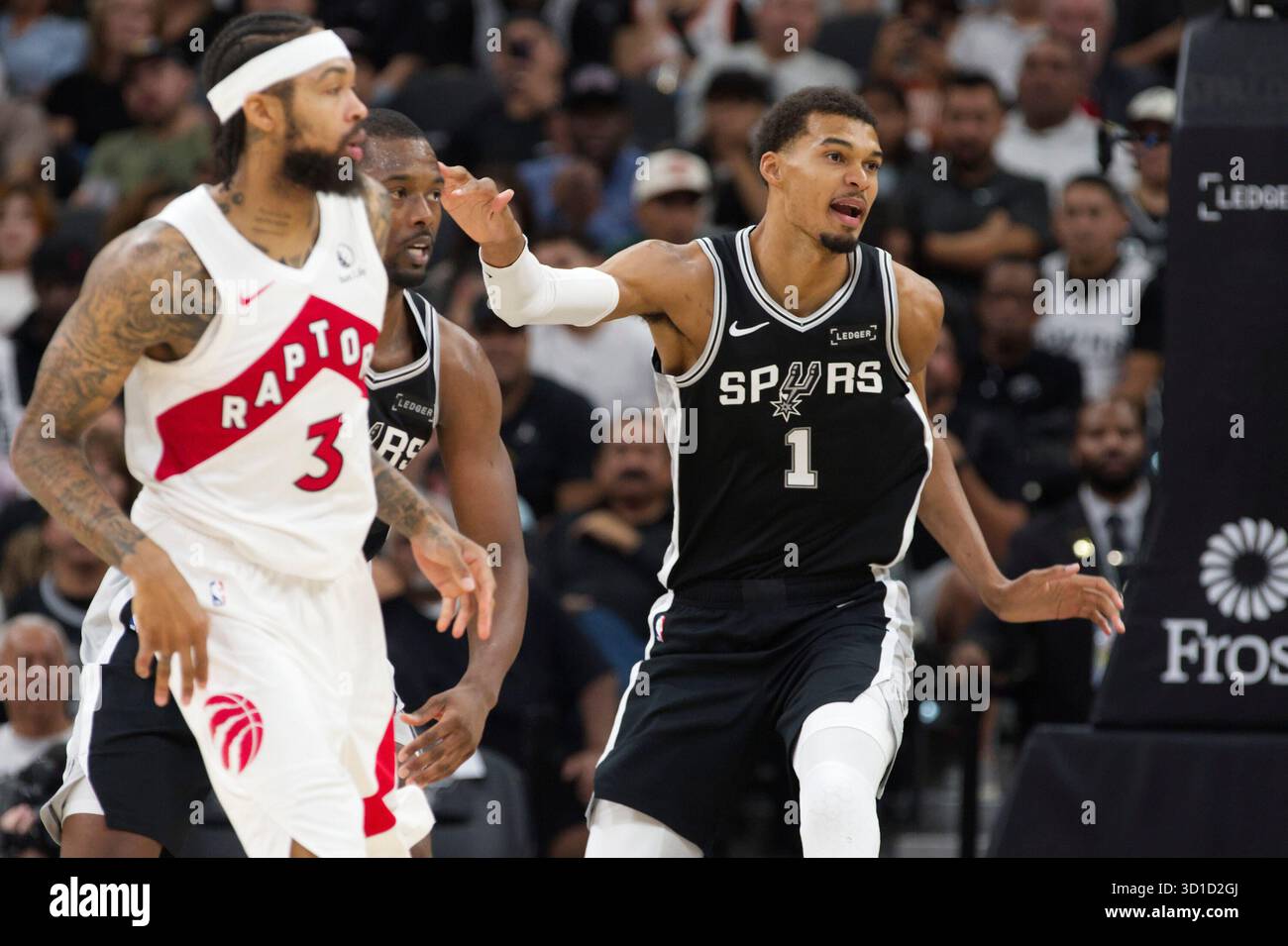 San Antonio Spurs center Victor Wembanyama (1) guards Toronto Raptors ...