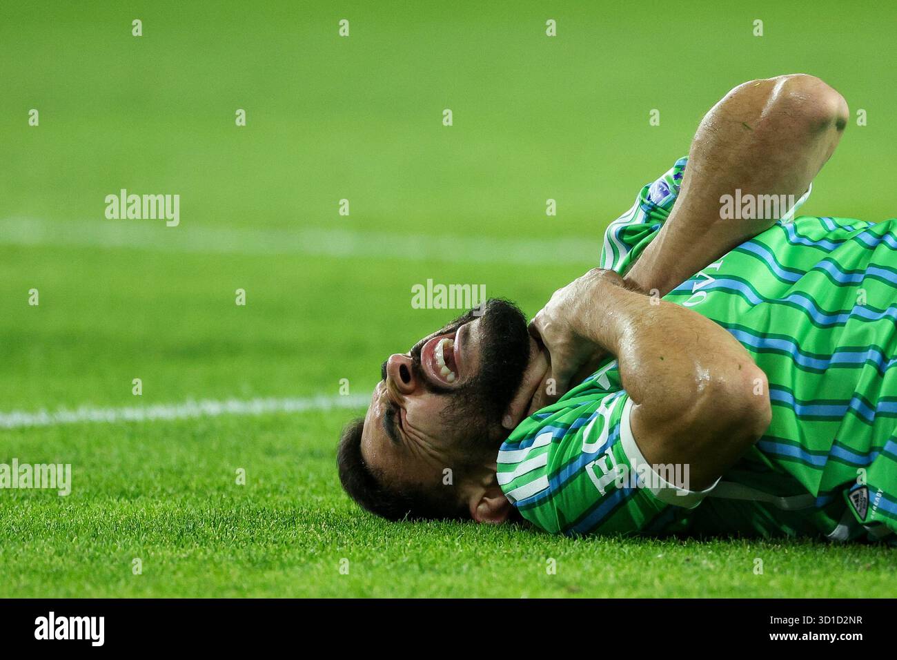 Seattle Sounders midfielder Alex Roldan (16) grimaces in the second ...