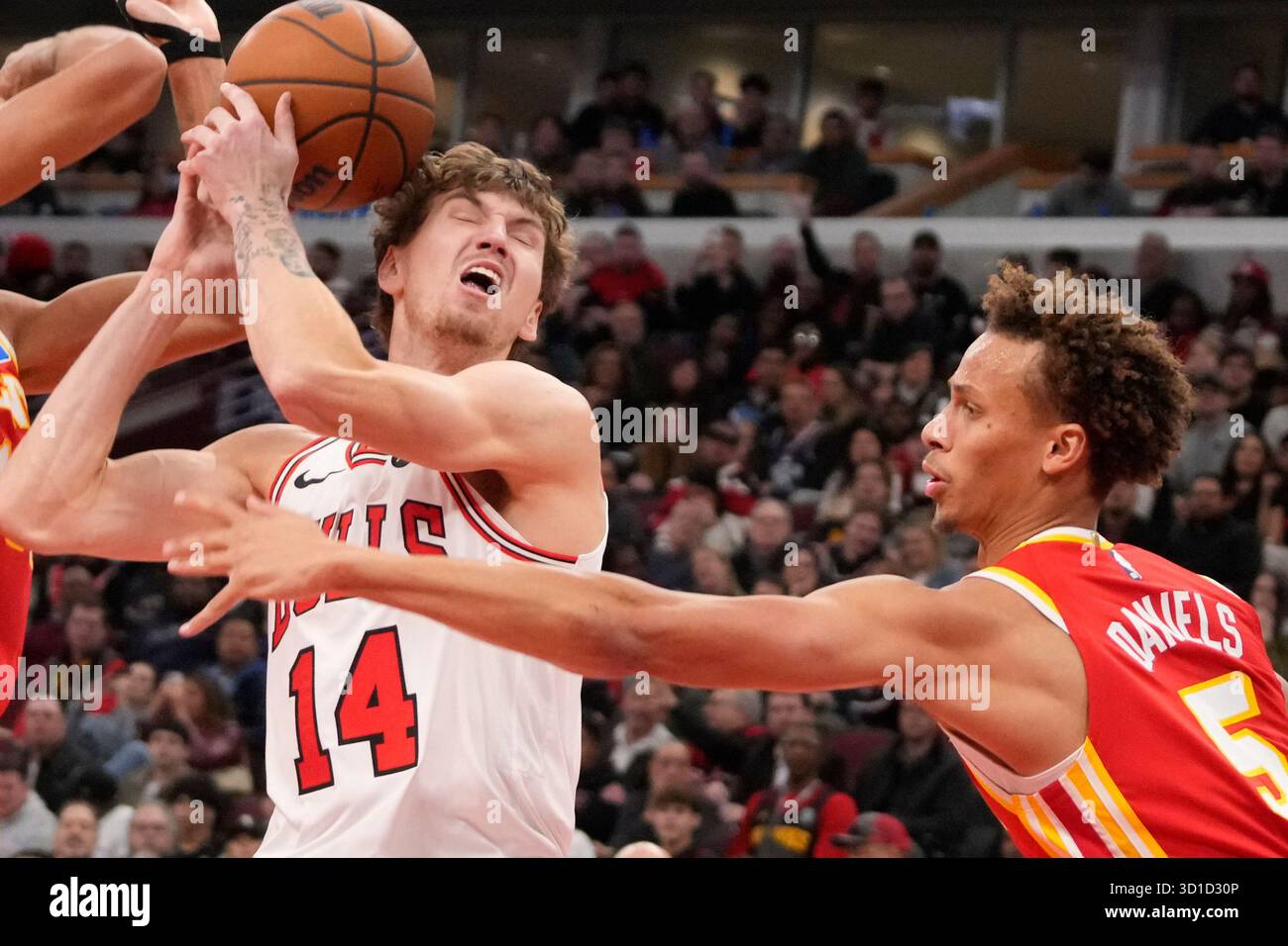 Atlanta Hawks guard Dyson Daniels, right, defends Chicago Bulls forward ...