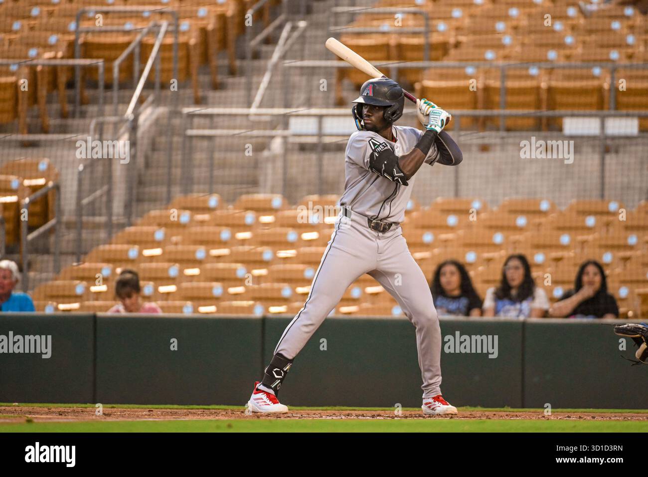 Salt River Rafters third baseman Jansel Luis (4) grounds out in the ...