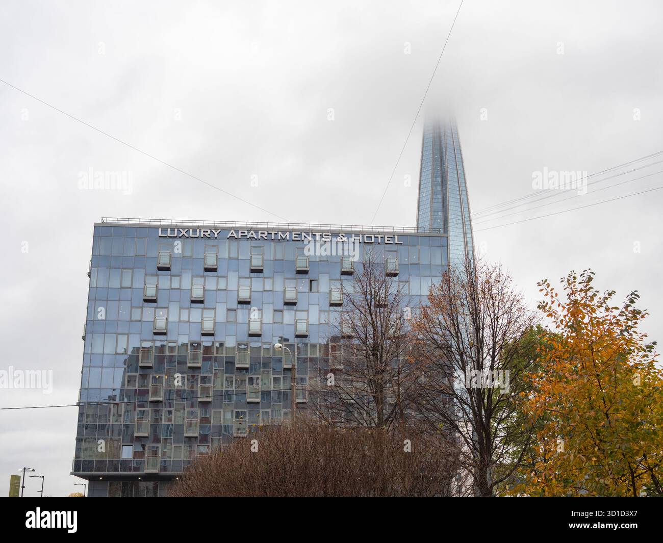 A modern hotel and the Lakhta Center seen in the city. The Lakhta ...