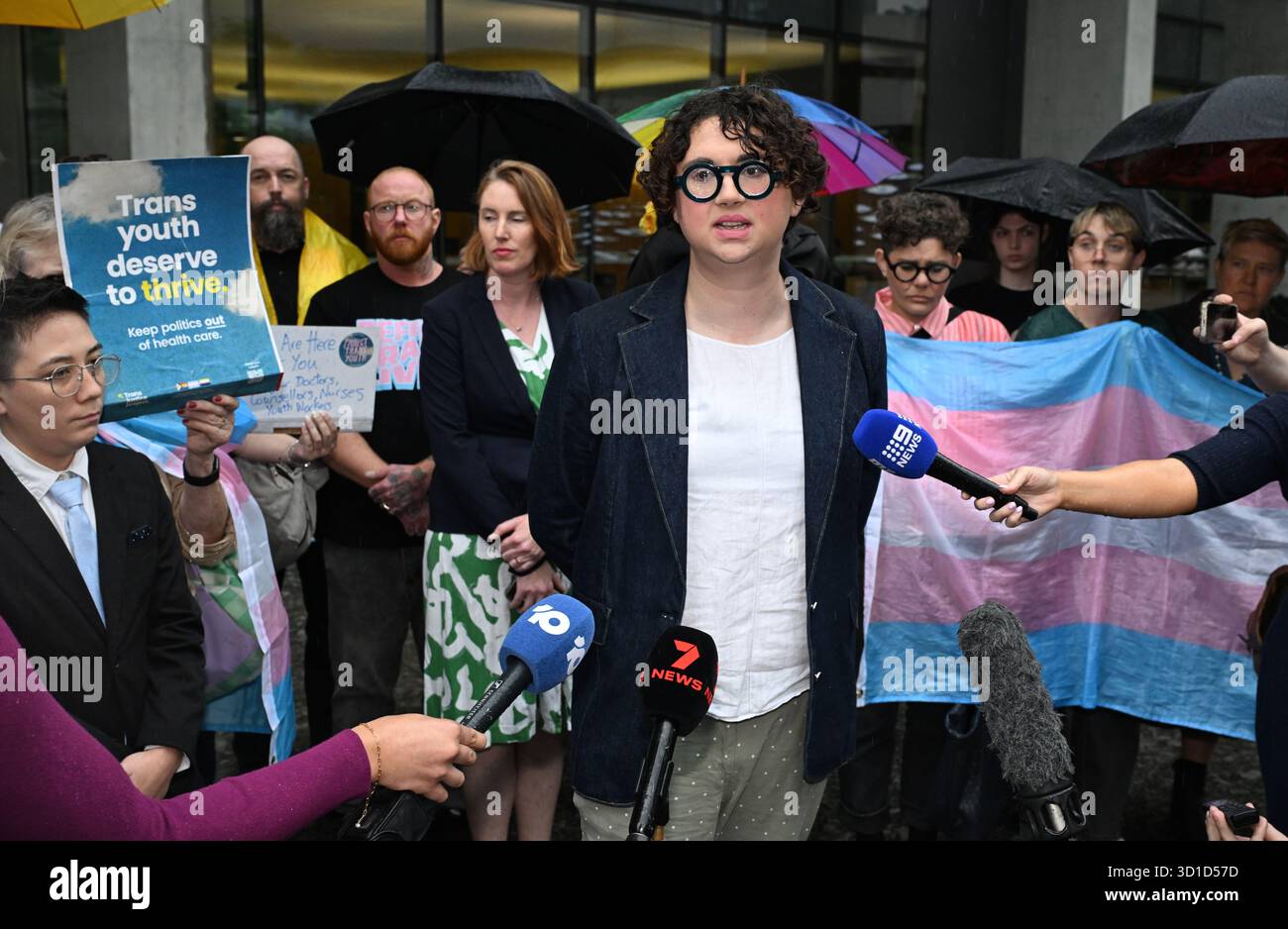 Jodie Hall (centre) speaks to the media outside the Supreme Court of ...