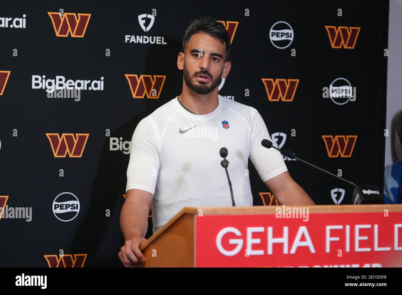 Washington Commanders quarterback Marcus Mariota speaks during a news ...