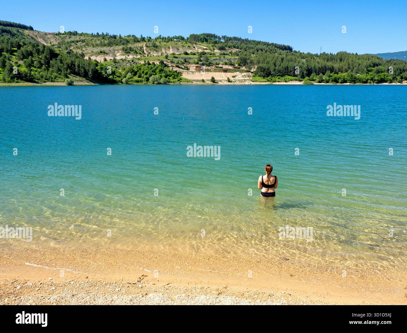 Woman swimming at Muscle Beach at Mandek Lake (Mandek Jezero Stock ...