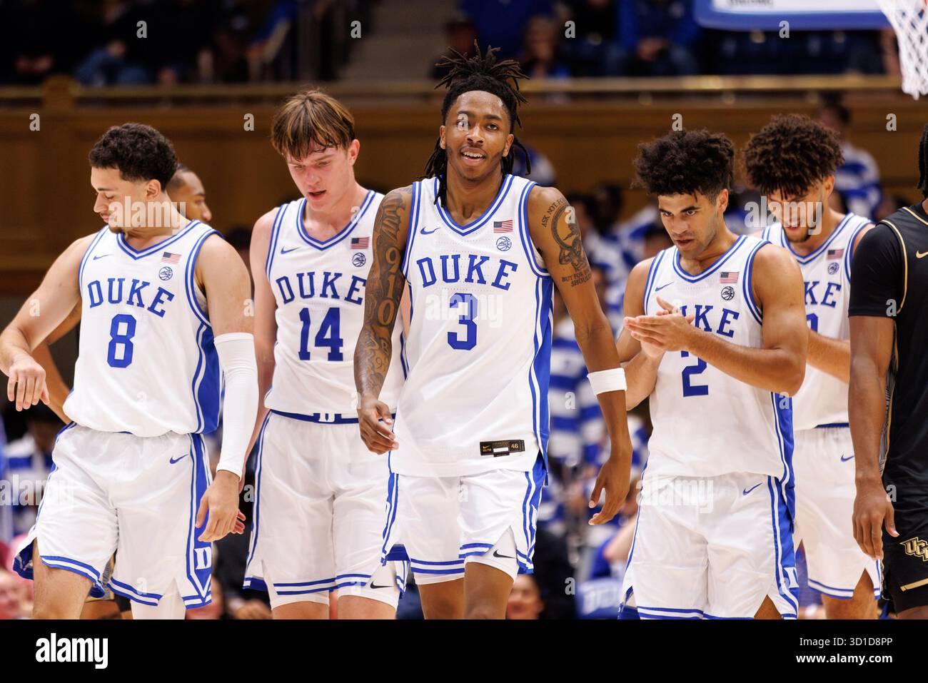 FILE - Duke's Darren Harris (8), Nikolas Khamenia (14), Isaiah Evans (3 ...