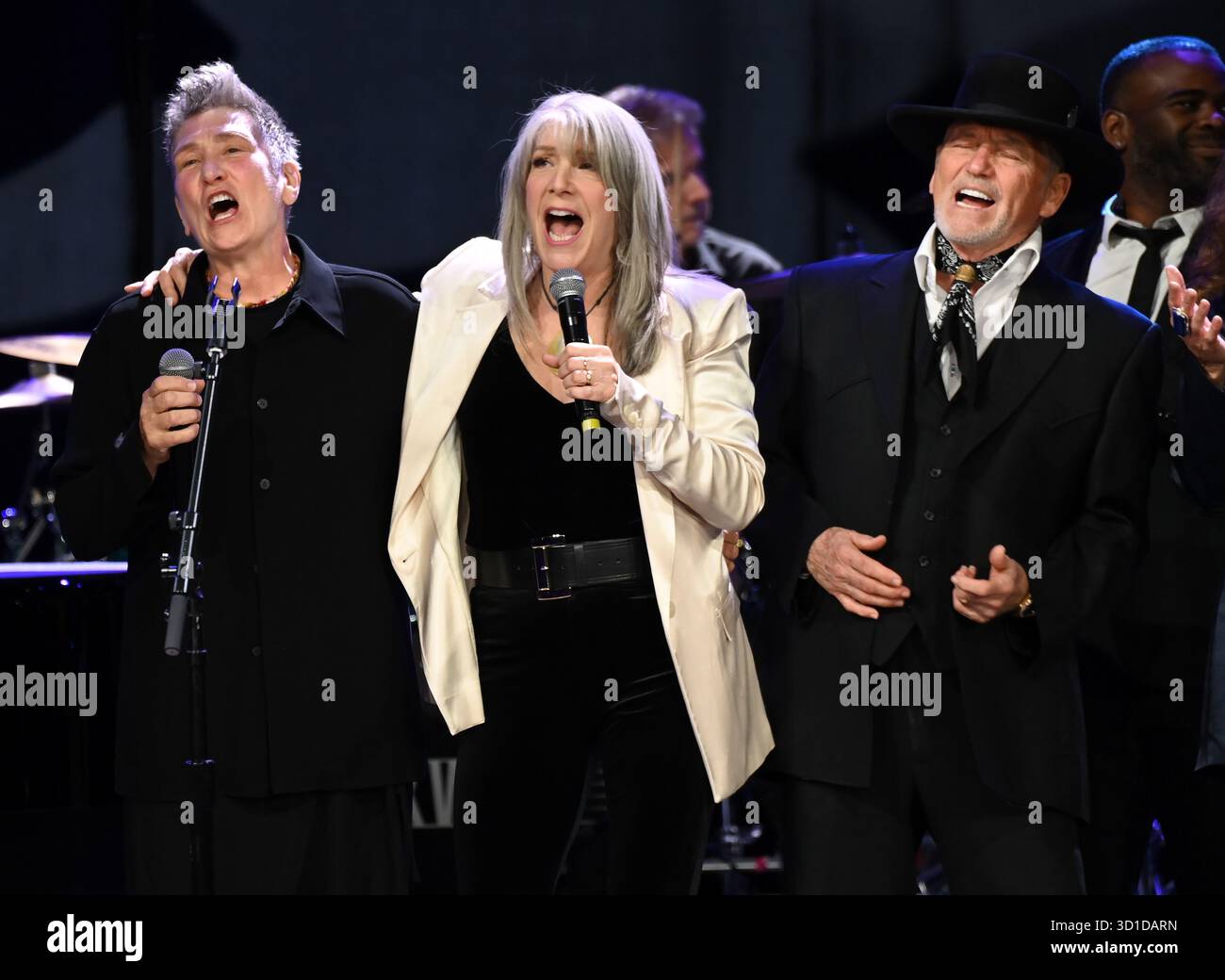 k.d.lang, Kathy Matea and Larry Gatlin onstage at The Music of My Life ...