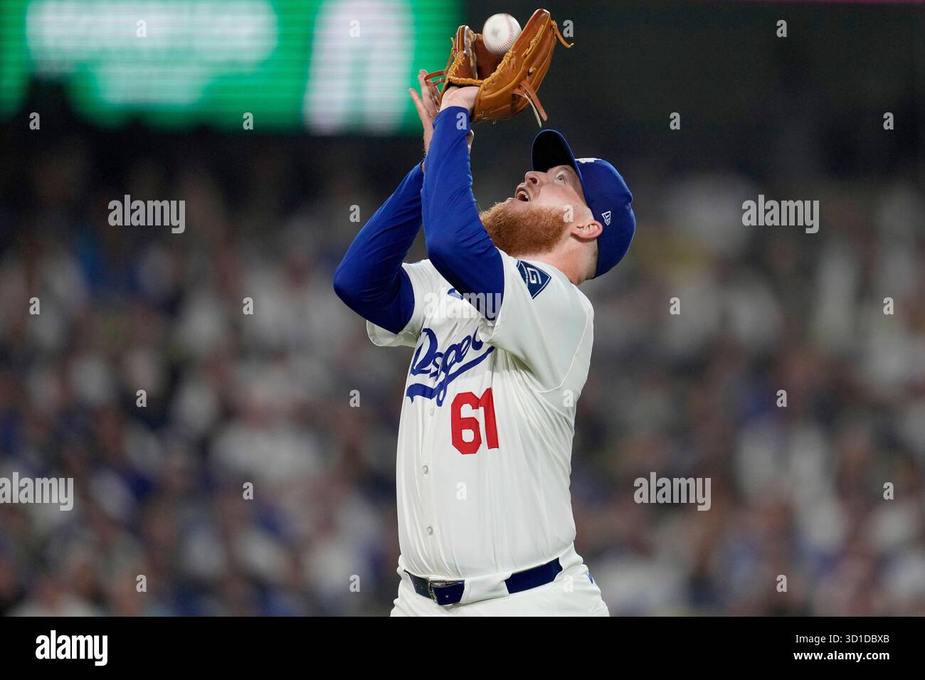 Los Angeles Dodgers pitcher Will Klein catches a pop-up hit by Toronto ...