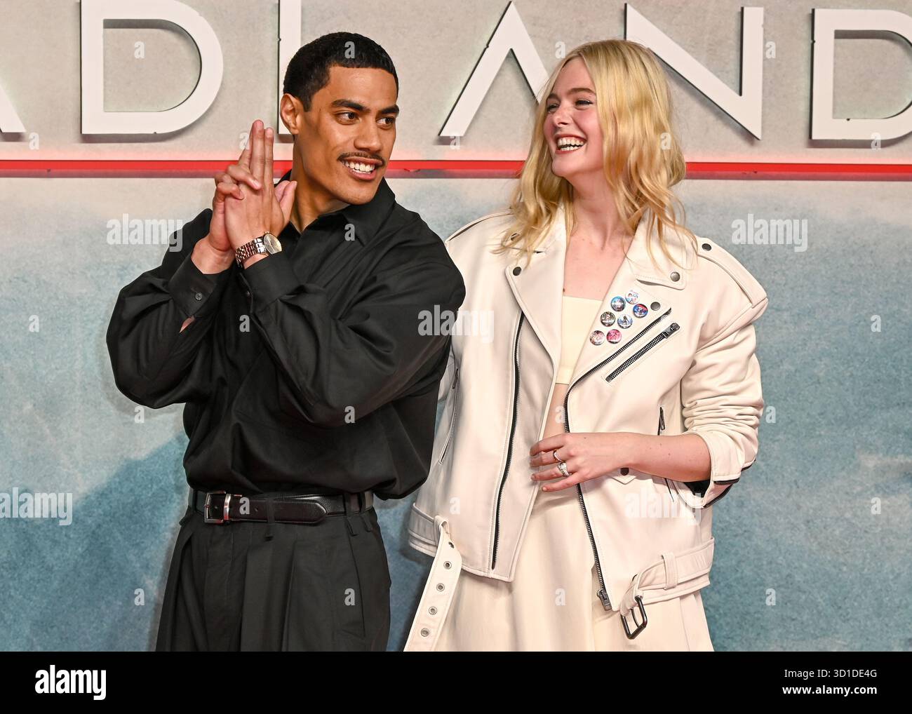 Dimitrius Schuster-Koloamatangi and Elle Fanning attends "Predator ...