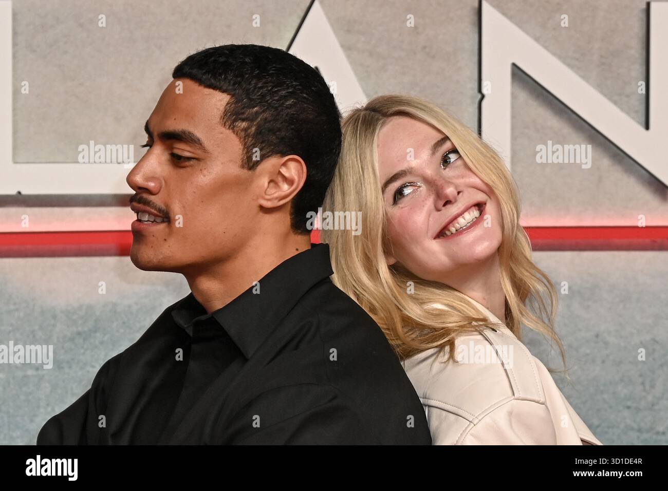 Dimitrius Schuster-Koloamatangi and Elle Fanning attends "Predator ...