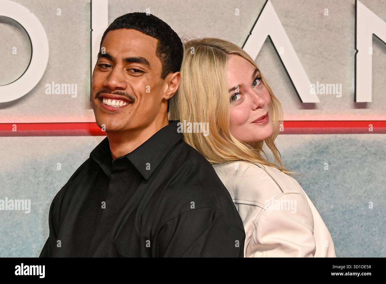 Dimitrius Schuster-Koloamatangi and Elle Fanning attends "Predator ...