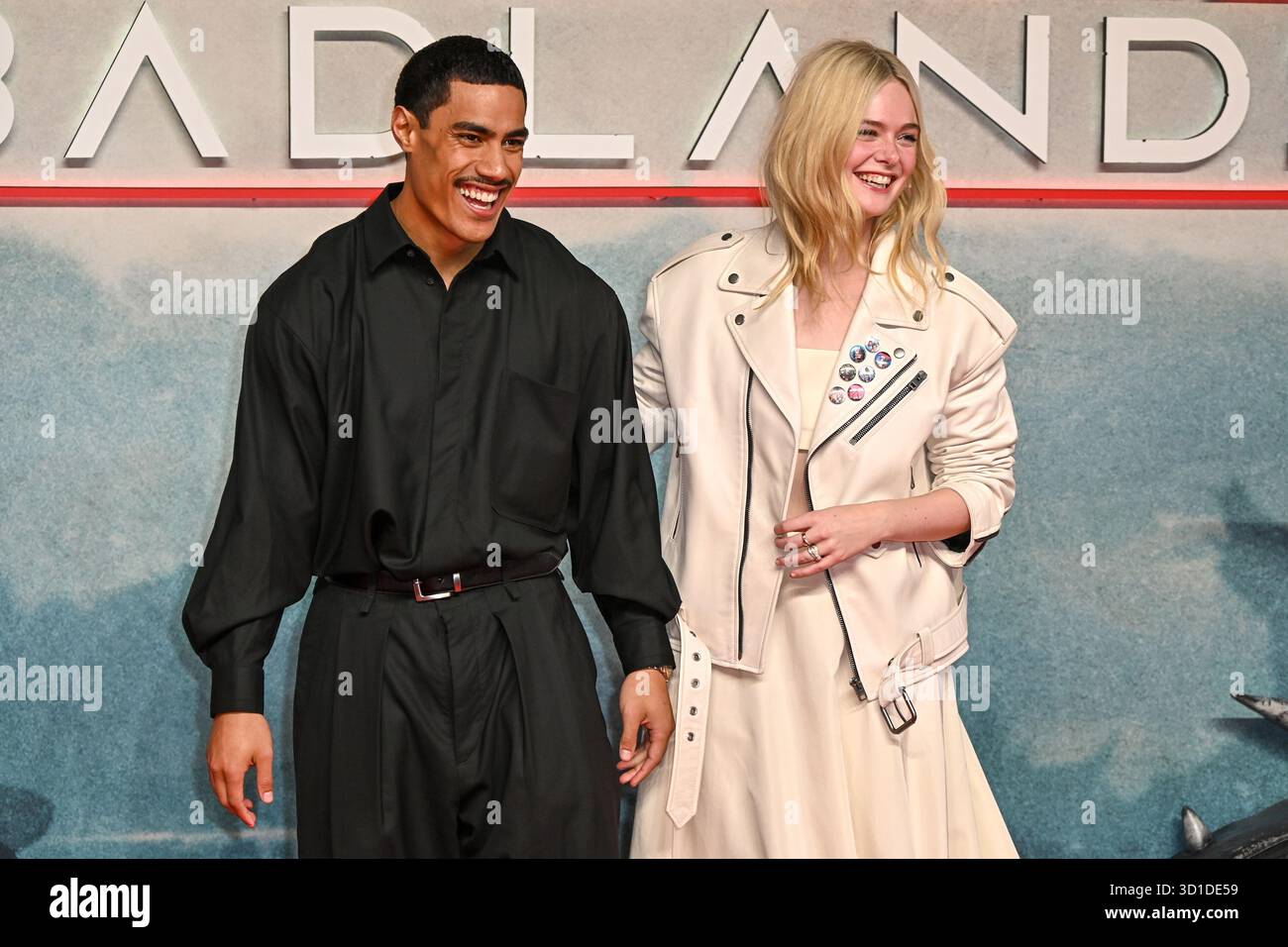 Dimitrius Schuster-Koloamatangi and Elle Fanning attends "Predator ...