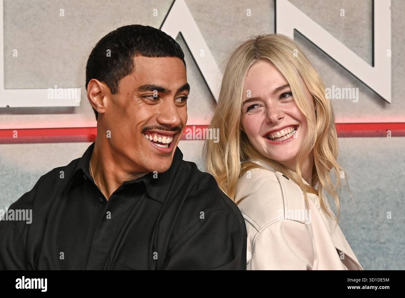 Dimitrius Schuster-Koloamatangi and Elle Fanning attends "Predator ...