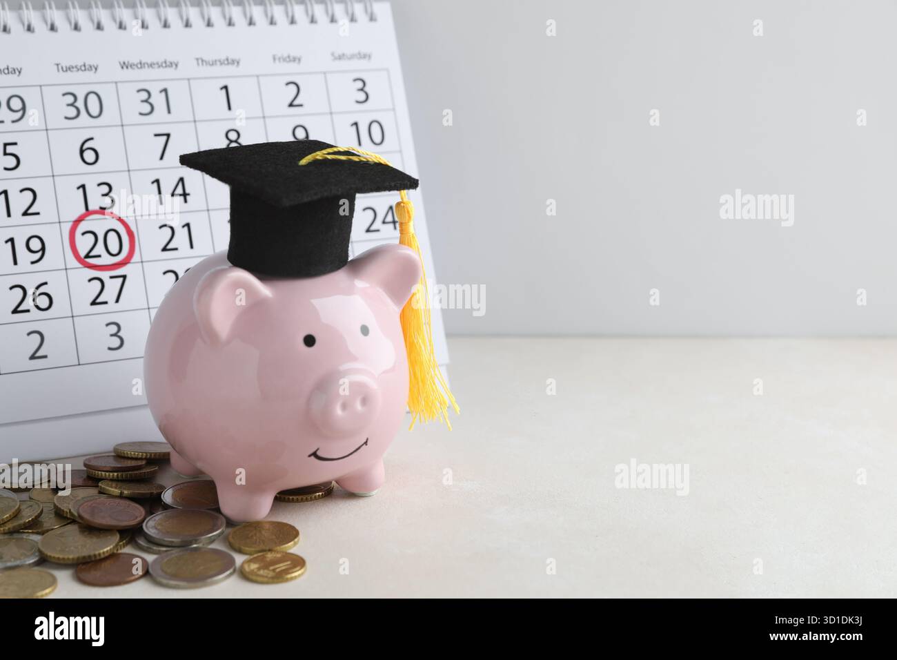 Education savings plan. Piggy bank with graduation cap, coins and ...