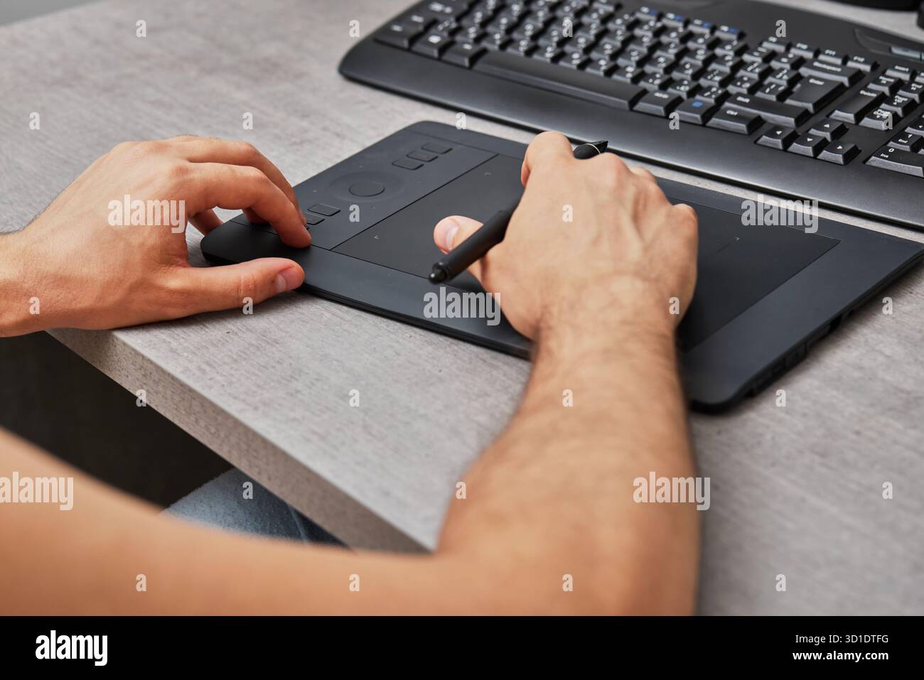 man drawing and retouching image on pc computer, using graphic digital ...
