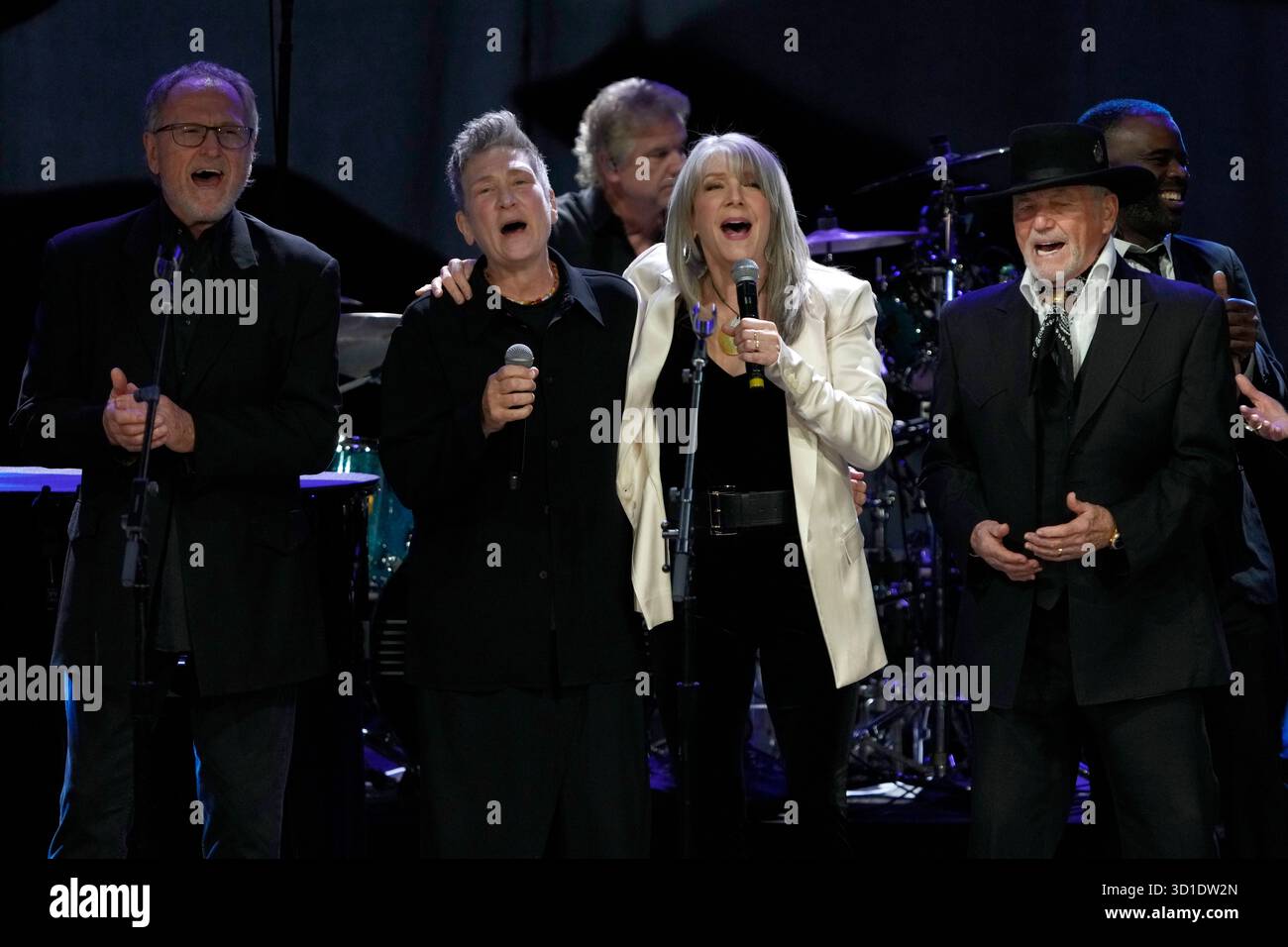 Rudy Gatlin, left; k.d. lang, second from left; Kathy Mattea, second ...
