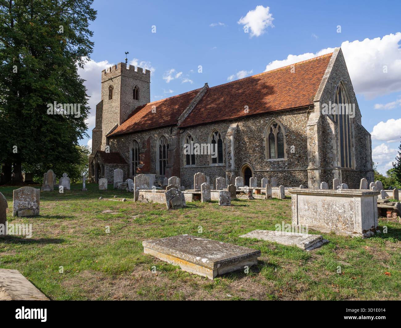 Exterior view of the medieval church of St Andrew, Bulmer, Essex, UK ...