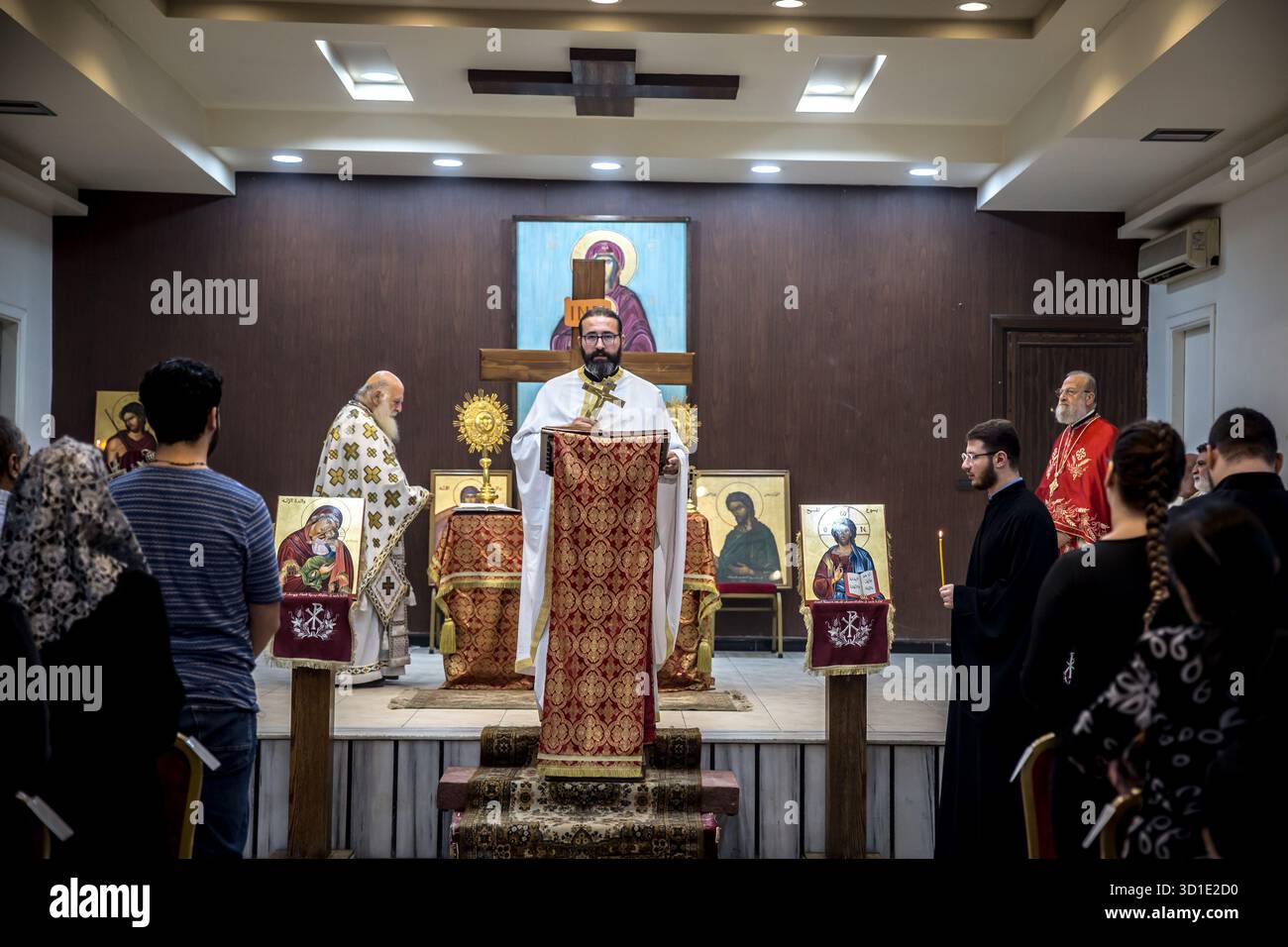 Father Youhanna Shahade seen during a Sunday service in Mar Elias ...