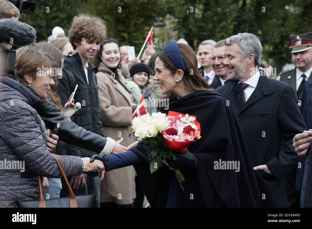 Denmark's Queen Mary, center, King Frederik X, right behind her, and ...