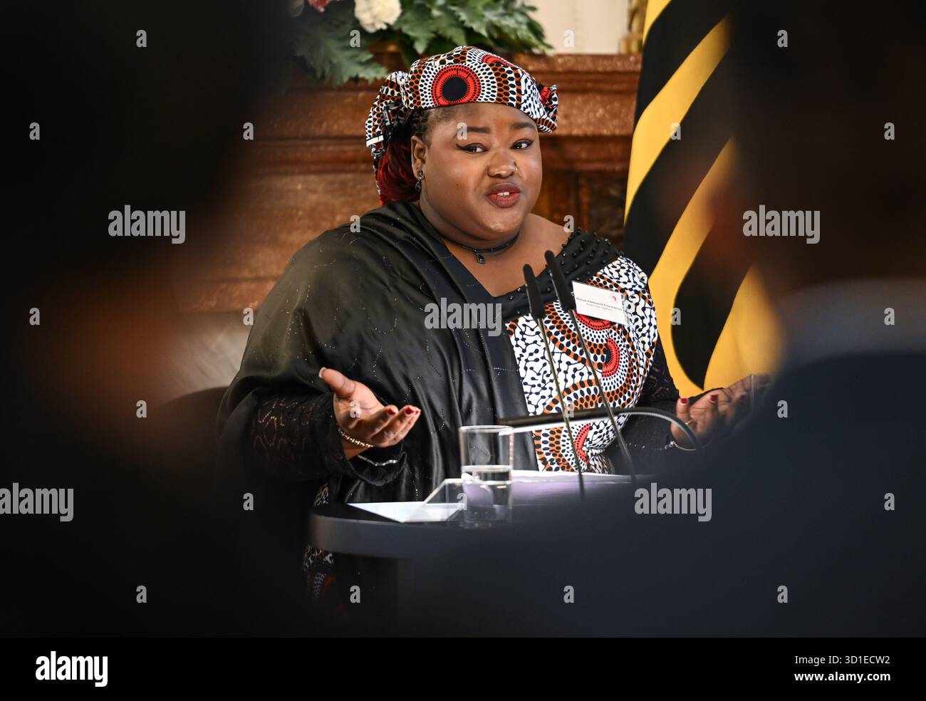 28 October 2025, Berlin: Nigerian Adebusola Kola-Aderoju Waliyat speaks ...