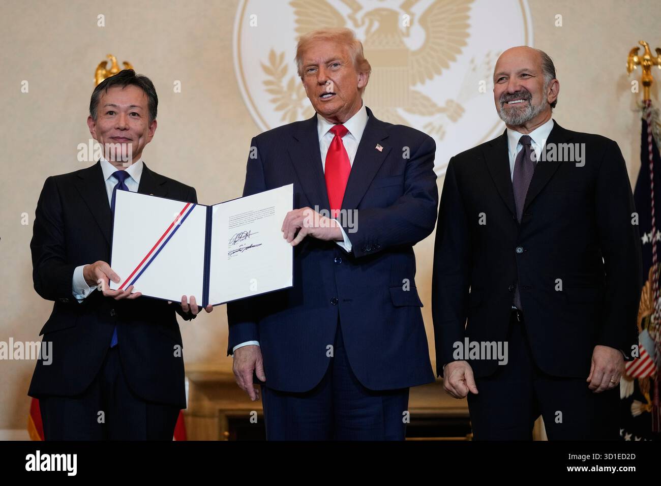 Hitachi President and CEO Toshiaki Tokunaga, from left, poses for a ...