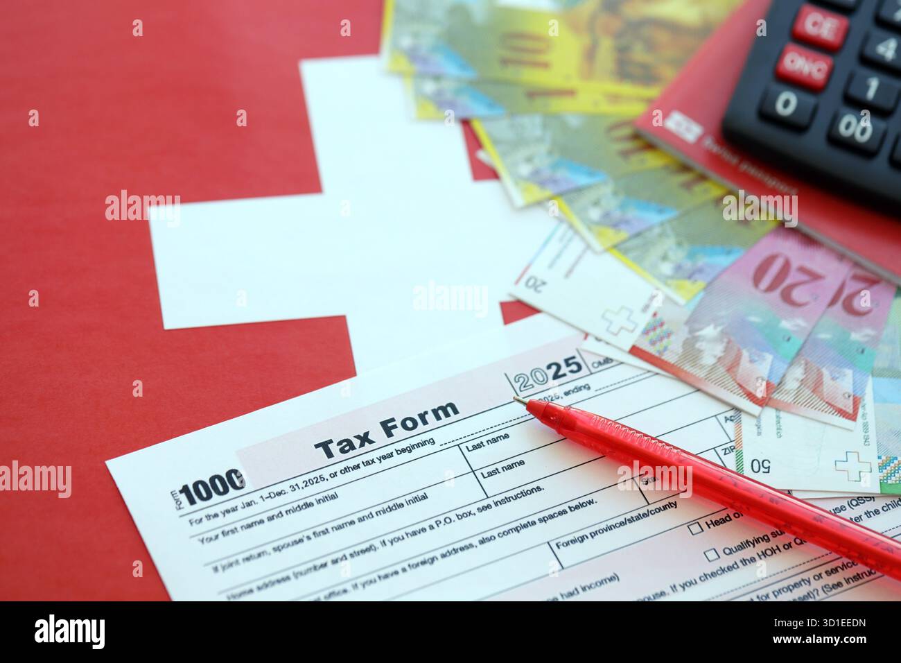 Swiss franc banknotes and tax form on flag. The current francs money ...