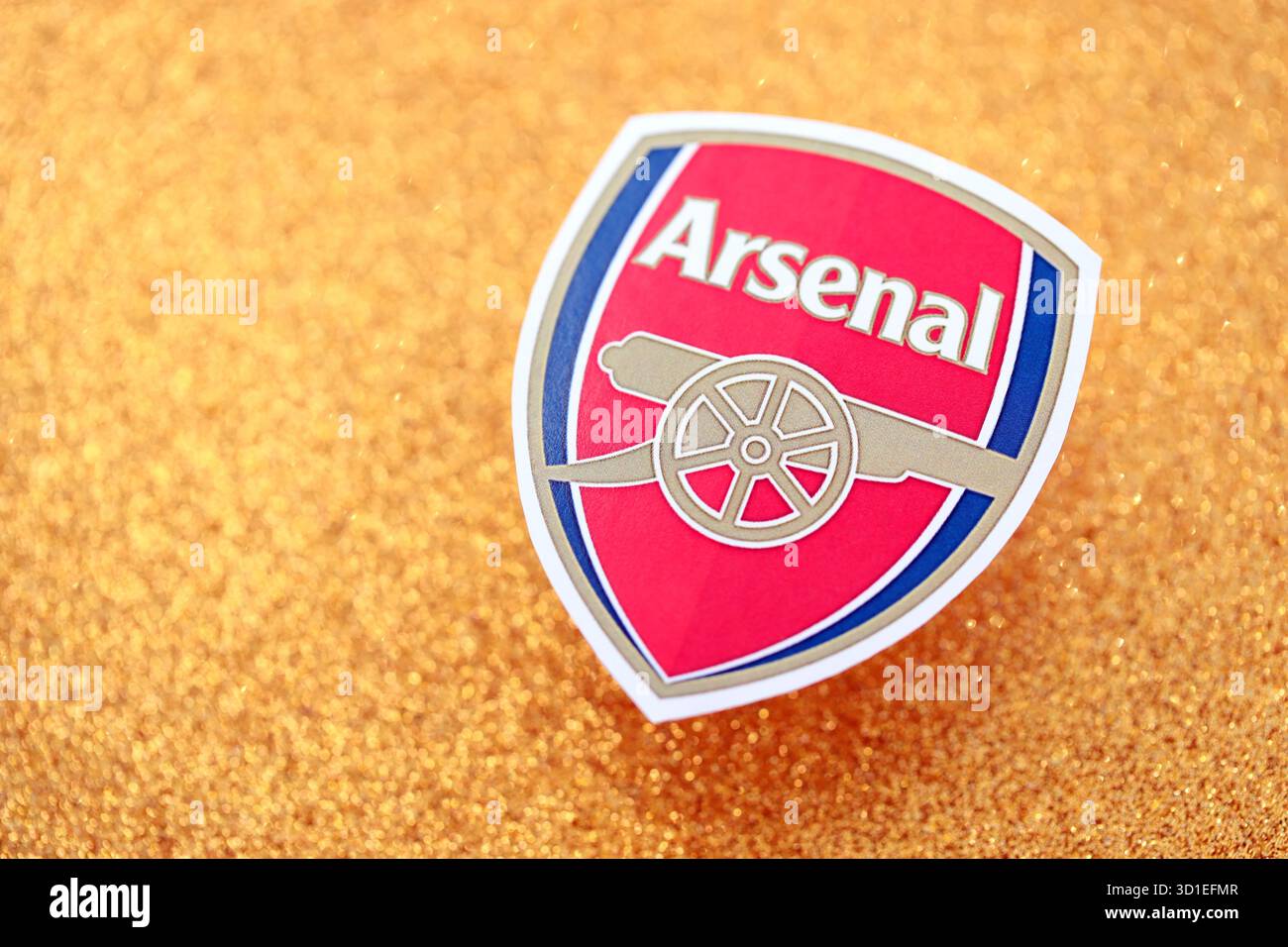 KYIV, UKRAINE - FEBRUARY 23, 2025 Arsenal FC football club badge lies ...