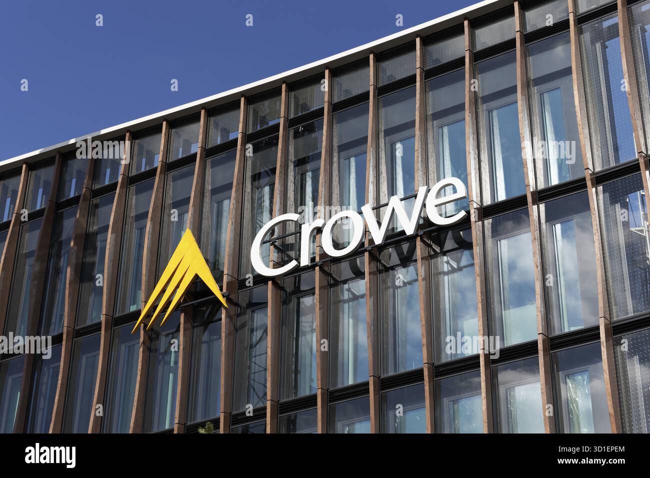 Crowe BPG, audit and consulting firm, logo on modern wooden facade with ...