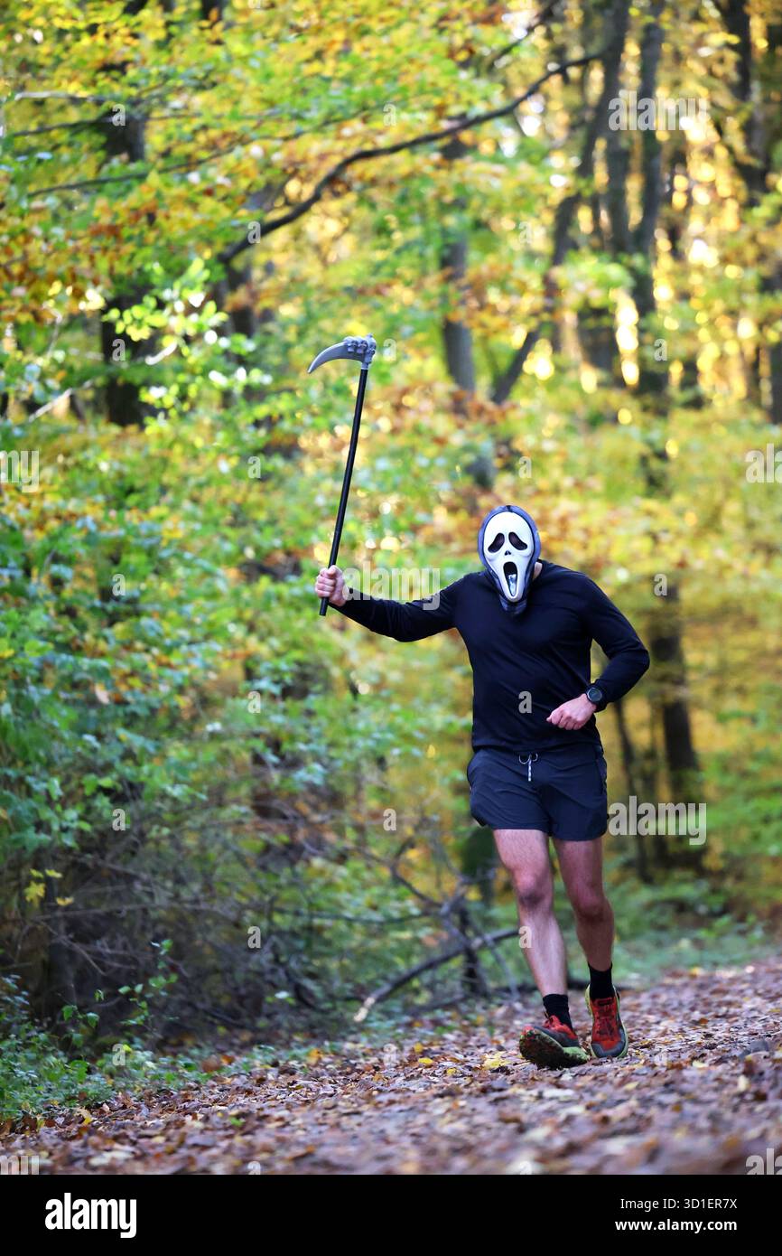 Runner with scythe hi-res stock photography and images - Alamy