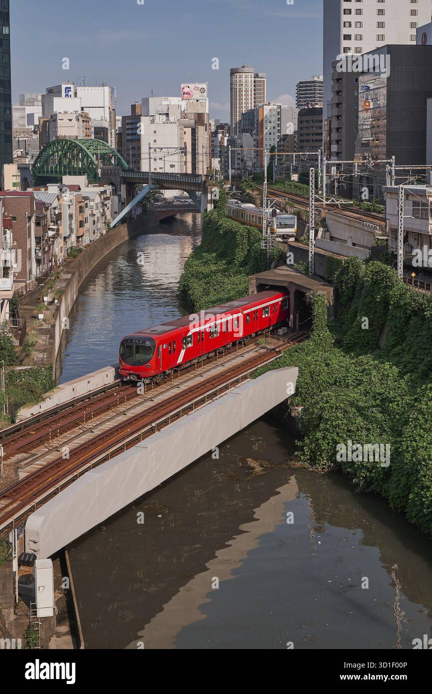 Iconic Train Crossing Spot over a Canal in Tokyo, Japan - Hijiri Bridge ...